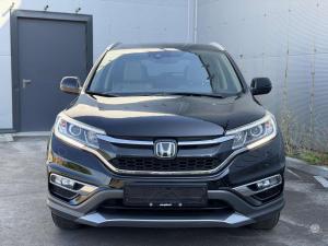 Black Honda CR-V 2016 in Utena, with an engine capacity of 1.60 L and mileage of 167 thousand km for 16200 €, photo 4 on AUTOMOTO.COM.LV