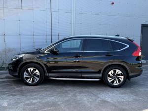 Black Honda CR-V 2016 in Utena, with an engine capacity of 1.60 L and mileage of 167 thousand km for 16200 €, photo 12 on AUTOMOTO.COM.LV
