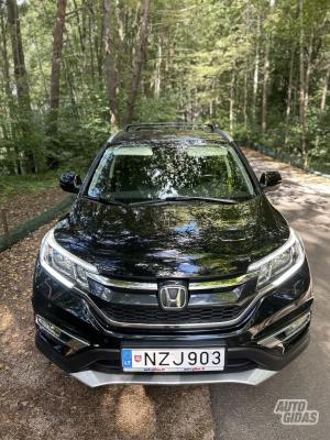 Black Honda CR-V 2016 in Vilnius, with an engine capacity of 1.60 L and mileage of 314 thousand km for 9350 €, photo 13 on AUTOMOTO.COM.LV