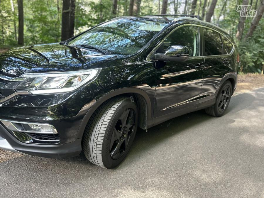 Black Honda CR-V 2016 in Vilnius, with an engine capacity of 1.60 L and mileage of 314 thousand km for 9350 €, photo 14 on AUTOMOTO.COM.LV