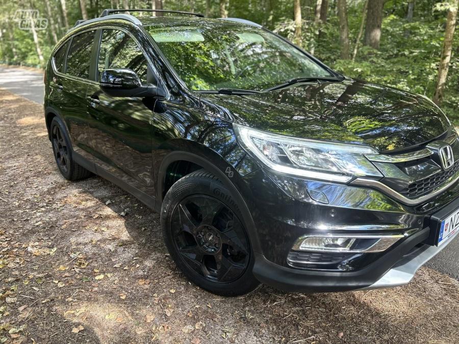 Black Honda CR-V 2016 in Vilnius, with an engine capacity of 1.60 L and mileage of 314 thousand km for 9350 €, photo 15 on AUTOMOTO.COM.LV