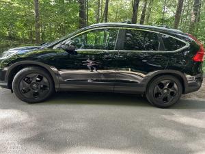 Black Honda CR-V 2016 in Vilnius, with an engine capacity of 1.60 L and mileage of 314 thousand km for 9350 €, photo 16 on AUTOMOTO.COM.LV