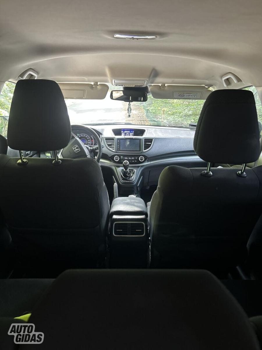 Black Honda CR-V 2016 in Vilnius, with an engine capacity of 1.60 L and mileage of 314 thousand km for 9350 €, photo 18 on AUTOMOTO.COM.LV