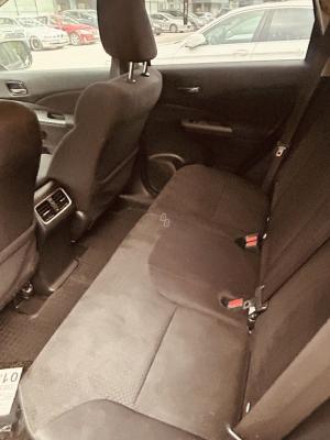 Black Honda CR-V 2016 in Vilnius, with an engine capacity of 1.60 L and mileage of 314 thousand km for 9350 €, photo 23 on AUTOMOTO.COM.LV