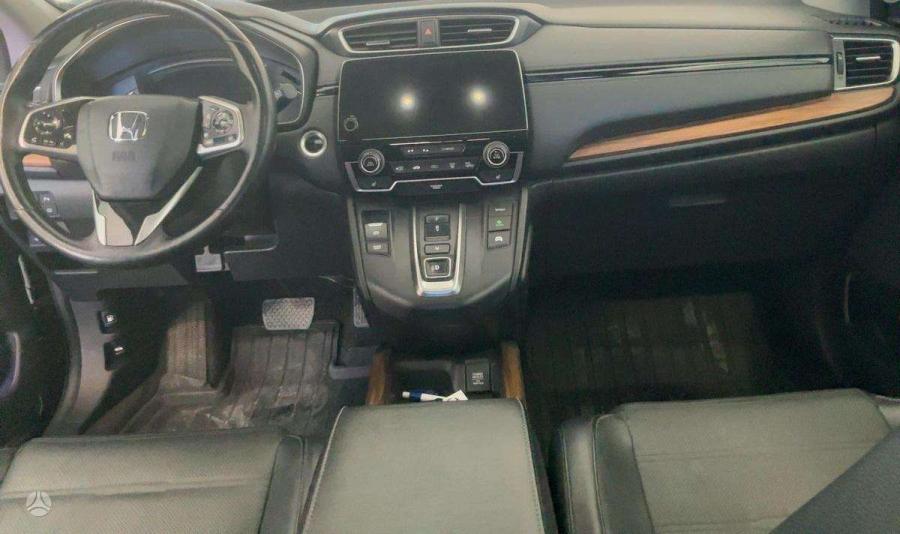 Black Honda CR-V 2020 in Vilnius, with an engine capacity of 1.99 L and mileage of 100 thousand km for 26999 €, photo 7 on AUTOMOTO.COM.LV
