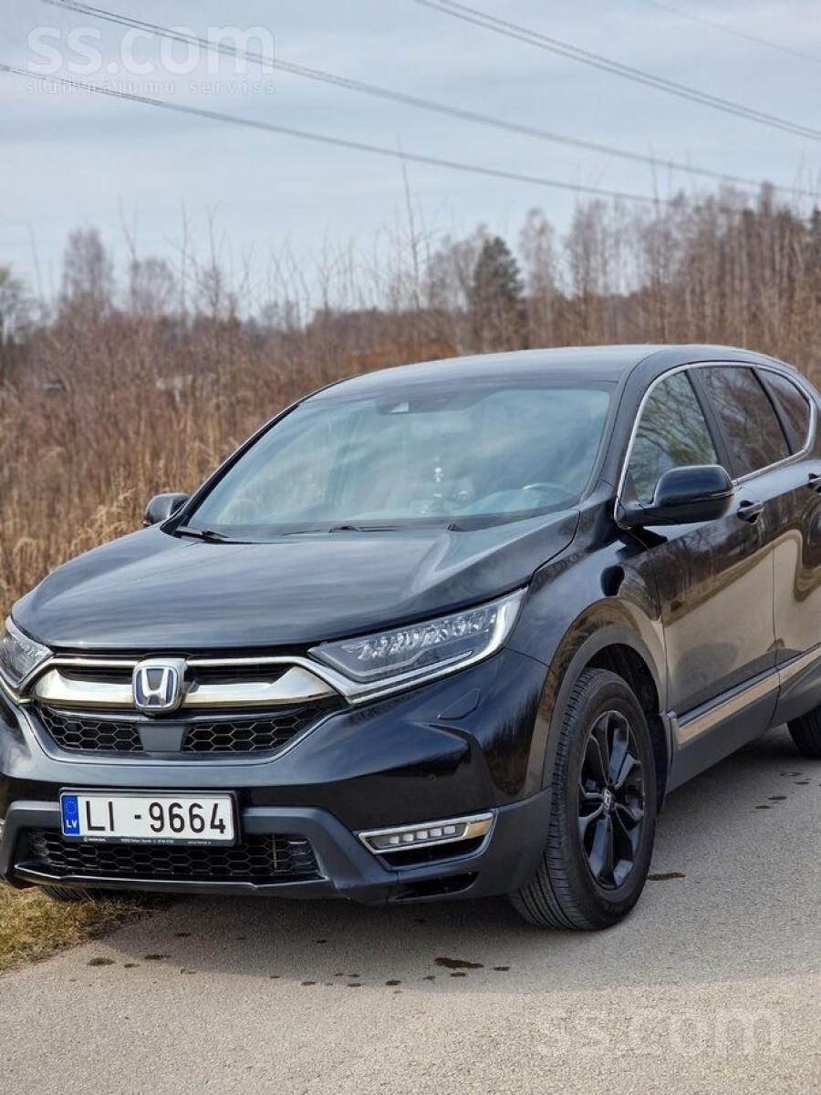 Black Honda CR-V 2021 in Riga, with an engine capacity of 2.00 L and mileage of 50 thousand km for 26500 €, photo 1 on AUTOMOTO.COM.LV