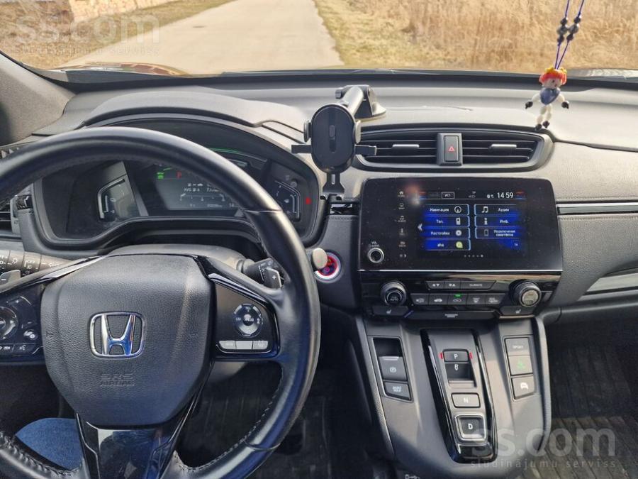Black Honda CR-V 2021 in Riga, with an engine capacity of 2.00 L and mileage of 54 thousand km for 26500 €, photo 6 on AUTOMOTO.COM.LV