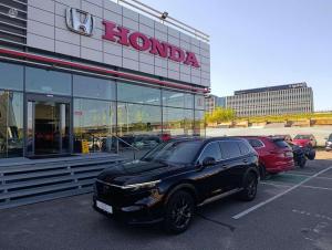 Black Honda CR-V 2024 in Vilnius, with an engine capacity of 1.99 L and mileage of 56 thousand km for 39900 €, photo 3 on AUTOMOTO.COM.LV