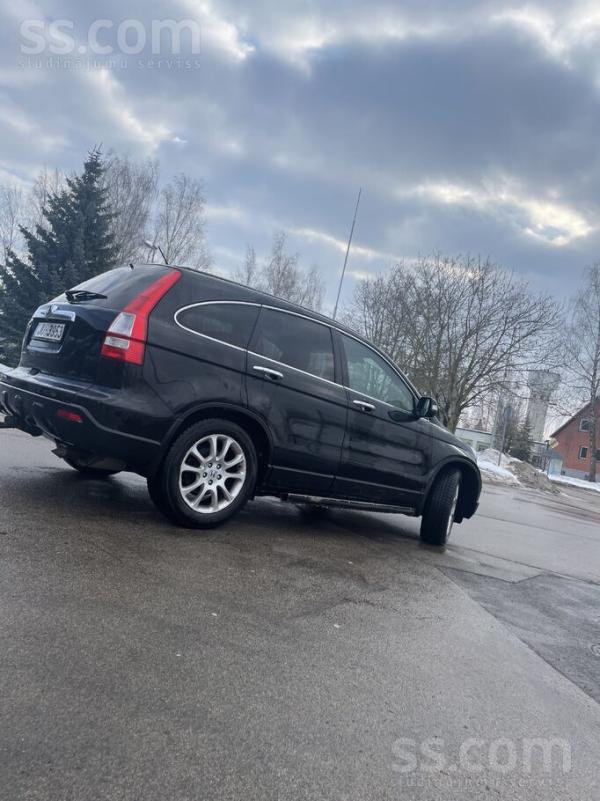 Melns Honda CR-V 2008 Ogre, ar dzinēja tilpumu 2.20 L un nobraukumu 327 tūkst. km par 2650 €, foto 4 vietnē AUTOMOTO.COM.LV