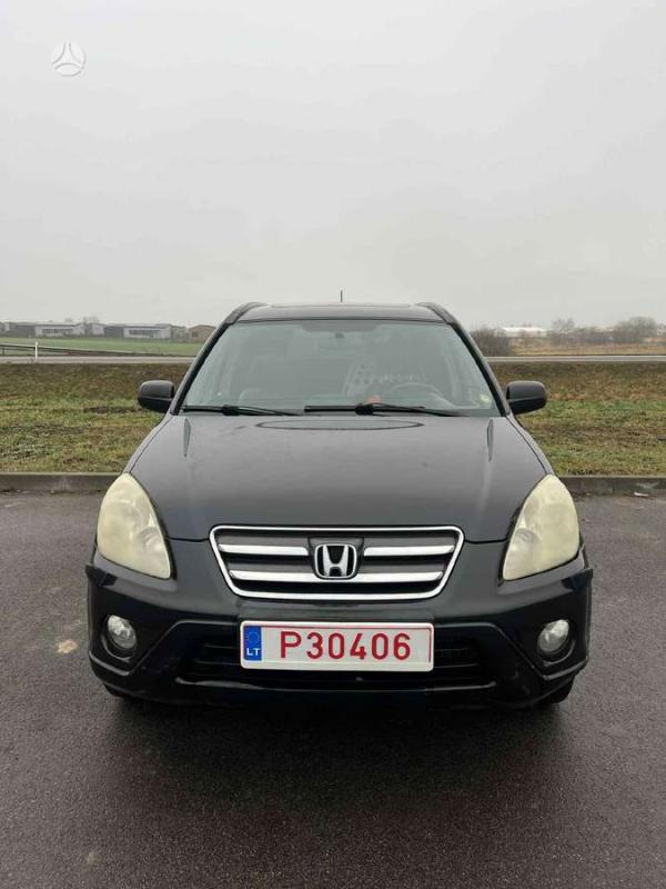 Black Honda CR-V 2005 in Kaunas, with an engine capacity of 2.20 L and mileage of 407 thousand km for 2800 €, photo 1 on AUTOMOTO.COM.LV