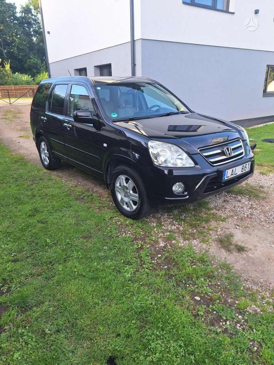 Black Honda CR-V 2005 in Kaunas, with an engine capacity of 2.20 L and mileage of 293 thousand km for 2850 €, photo 4 on AUTOMOTO.COM.LV
