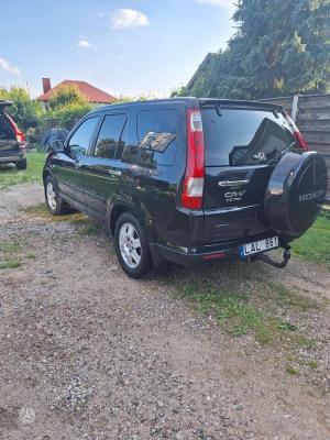 Black Honda CR-V 2005 in Kaunas, with an engine capacity of 2.20 L and mileage of 293 thousand km for 2850 €, photo 5 on AUTOMOTO.COM.LV