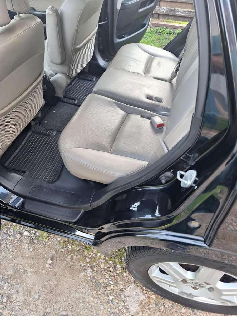 Black Honda CR-V 2005 in Kaunas, with an engine capacity of 2.20 L and mileage of 293 thousand km for 2850 €, photo 10 on AUTOMOTO.COM.LV