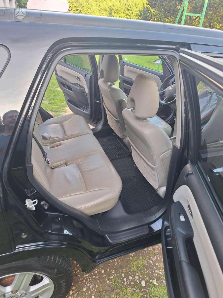 Black Honda CR-V 2005 in Kaunas, with an engine capacity of 2.20 L and mileage of 293 thousand km for 2850 €, photo 11 on AUTOMOTO.COM.LV