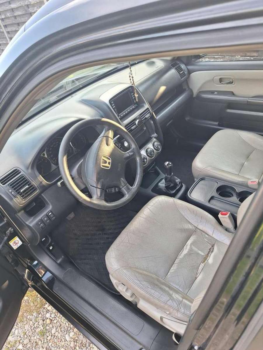 Black Honda CR-V 2005 in Kaunas, with an engine capacity of 2.20 L and mileage of 293 thousand km for 2850 €, photo 12 on AUTOMOTO.COM.LV
