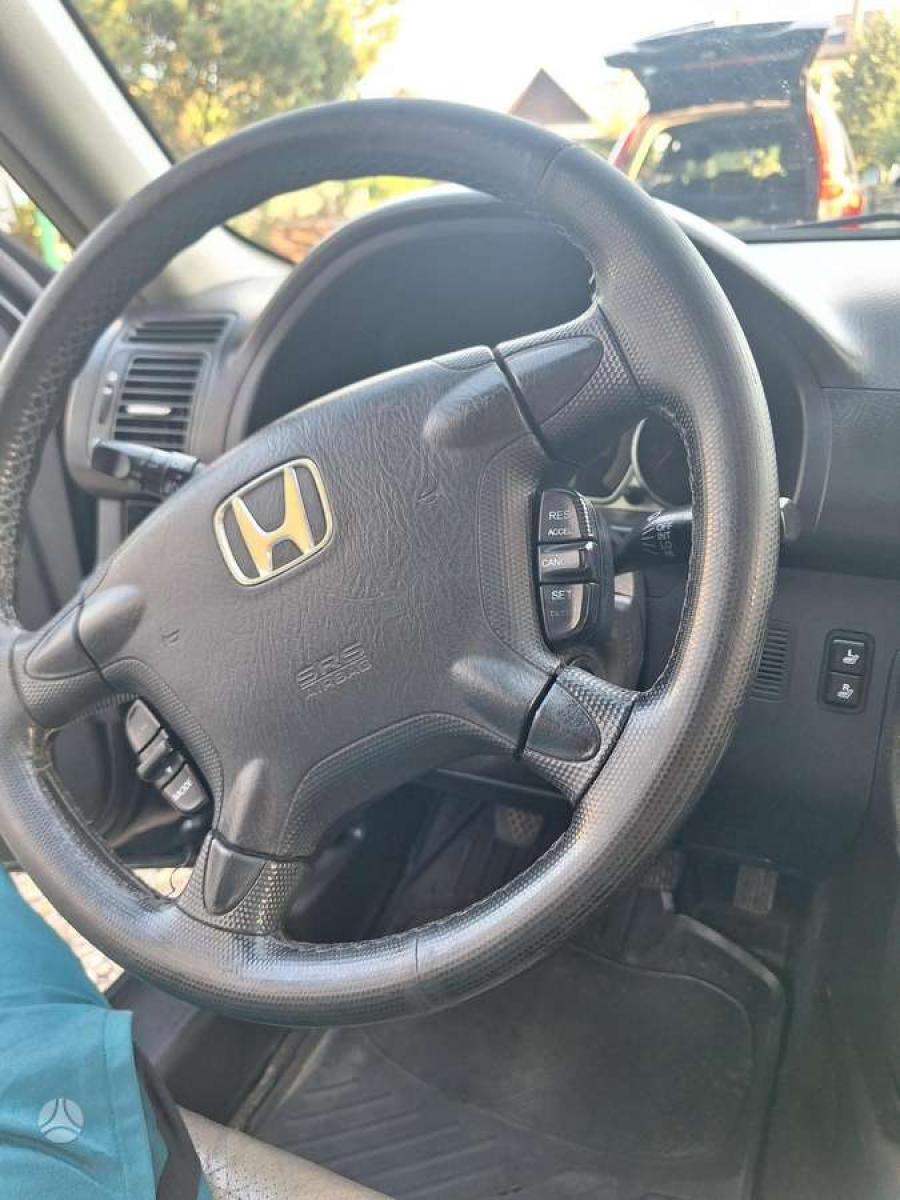 Black Honda CR-V 2005 in Kaunas, with an engine capacity of 2.20 L and mileage of 293 thousand km for 2850 €, photo 15 on AUTOMOTO.COM.LV