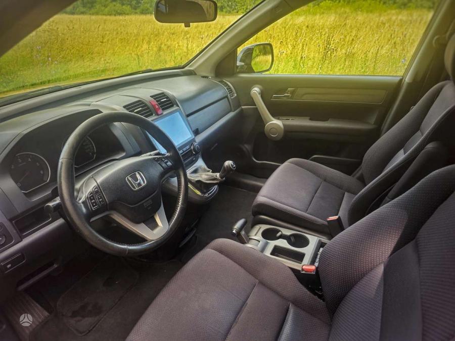 Melns Honda CR-V 2007 Panevēža, ar dzinēja tilpumu 2.20 L un nobraukumu 339 tūkst. km par 3900 €, foto 8 vietnē AUTOMOTO.COM.LV