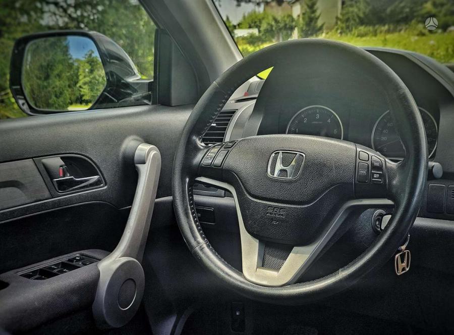 Melns Honda CR-V 2007 Panevēža, ar dzinēja tilpumu 2.20 L un nobraukumu 339 tūkst. km par 3900 €, foto 15 vietnē AUTOMOTO.COM.LV