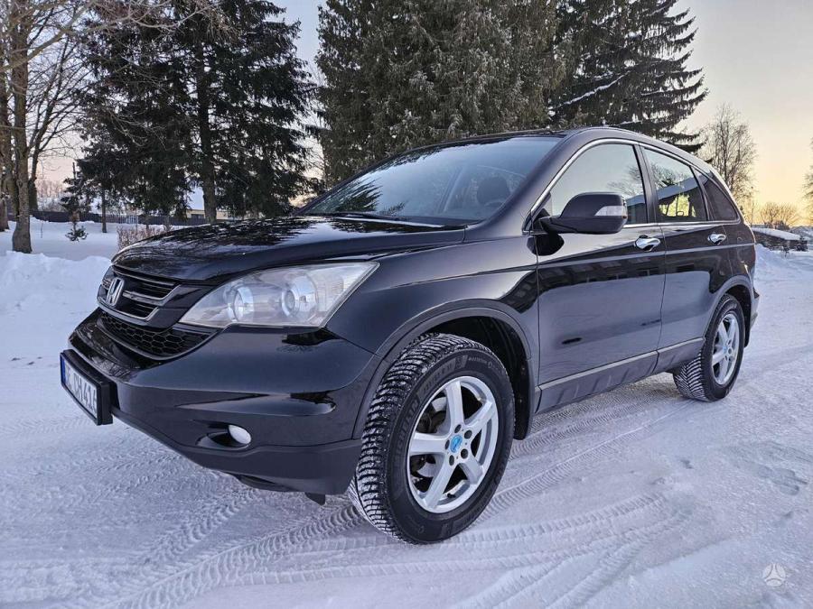Black Honda CR-V 2010 in Radviliskis, with an engine capacity of 2.20 L and mileage of 280 thousand km for 6800 €, photo 1 on AUTOMOTO.COM.LV