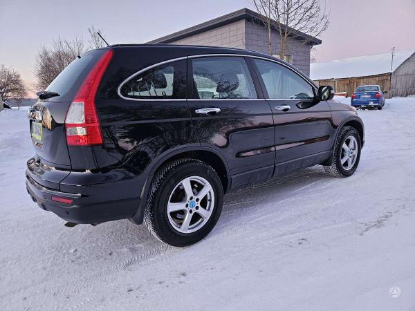 Black Honda CR-V 2010 in Radviliskis, with an engine capacity of 2.20 L and mileage of 280 thousand km for 6800 €, photo 6 on AUTOMOTO.COM.LV