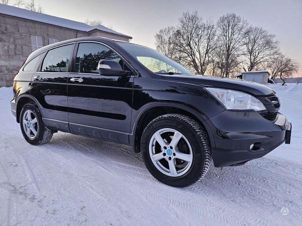 Black Honda CR-V 2010 in Radviliskis, with an engine capacity of 2.20 L and mileage of 280 thousand km for 6800 €, photo 7 on AUTOMOTO.COM.LV