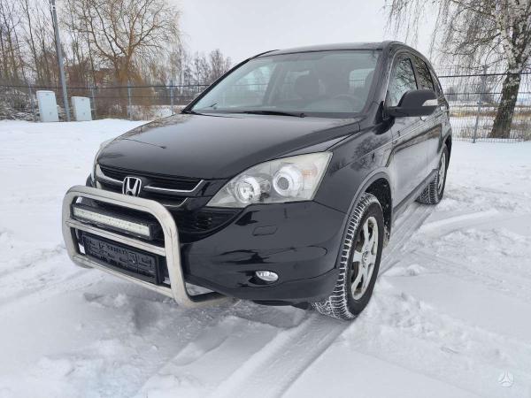 Melns Honda CR-V 2012 Marijampole, ar dzinēja tilpumu 2.20 L un nobraukumu 168 tūkst. km par 9350 €, foto 2 vietnē AUTOMOTO.COM.LV