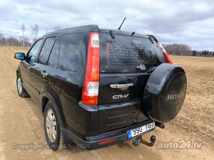 Melns Honda CR-V 2006 Pelva, ar dzinēja tilpumu 2.00 L un nobraukumu 419 tūkst. km par 3000 €, foto 4 vietnē AUTOMOTO.COM.LV