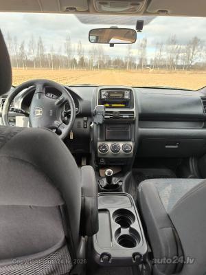 Melns Honda CR-V 2006 Pelva, ar dzinēja tilpumu 2.00 L un nobraukumu 419 tūkst. km par 3000 €, foto 7 vietnē AUTOMOTO.COM.LV
