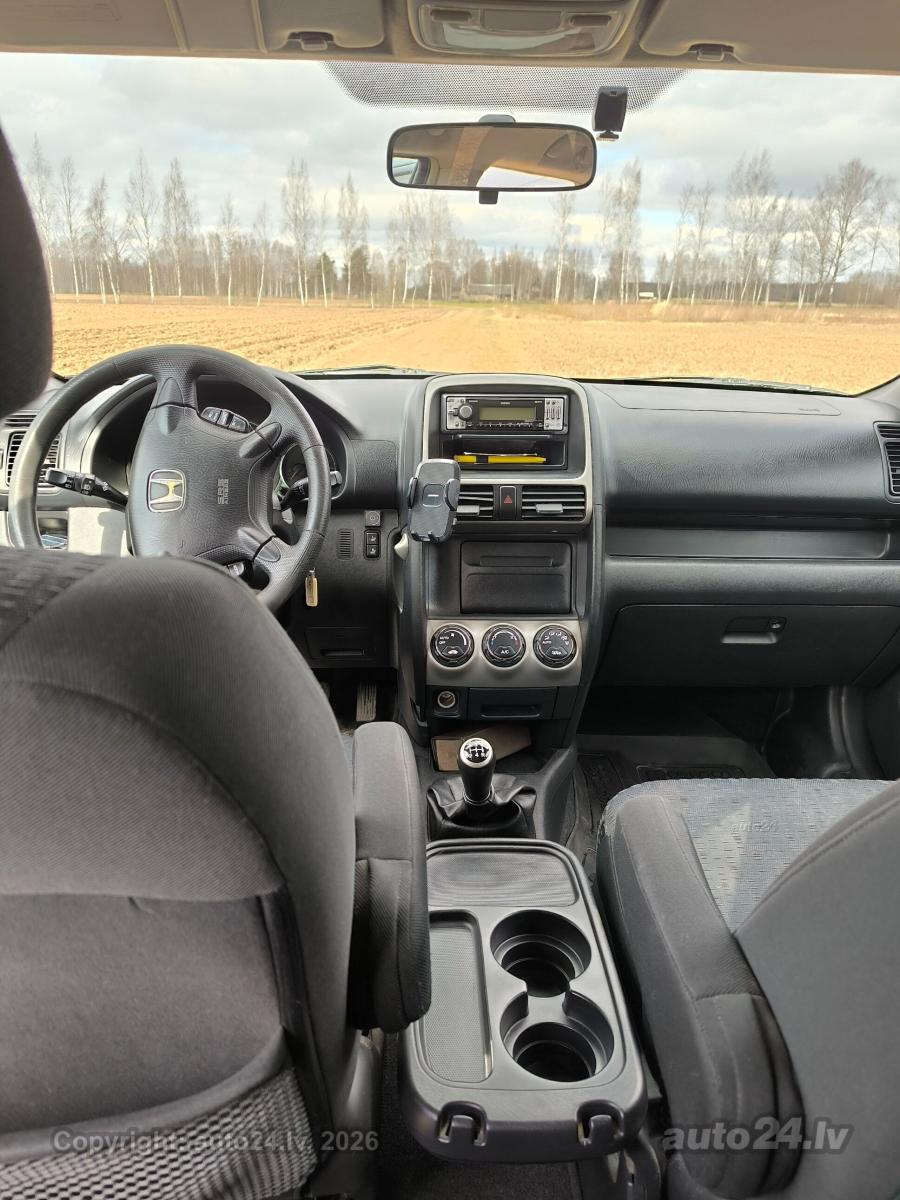 Melns Honda CR-V 2006 Pelva, ar dzinēja tilpumu 2.00 L un nobraukumu 419 tūkst. km par 3000 €, foto 7 vietnē AUTOMOTO.COM.LV