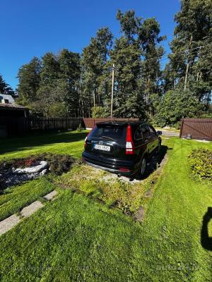 Black Honda CR-V 2010 in Tallinn, with an engine capacity of 2.00 L and mileage of 0 thousand km for 6800 €, photo 4 on AUTOMOTO.COM.LV