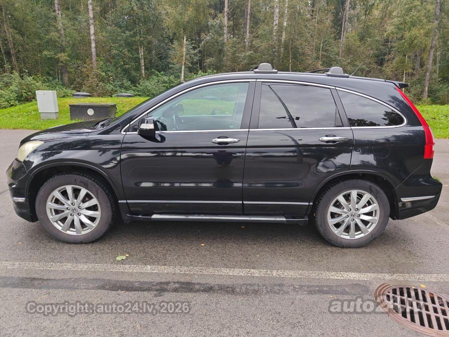 Black Honda CR-V 2010 in Tallinn, with an engine capacity of 2.00 L and mileage of 259 thousand km for 7000 €, photo 7 on AUTOMOTO.COM.LV