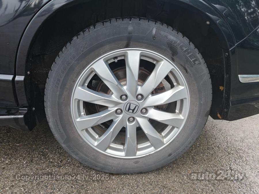 Black Honda CR-V 2010 in Tallinn, with an engine capacity of 2.00 L and mileage of 259 thousand km for 7000 €, photo 14 on AUTOMOTO.COM.LV