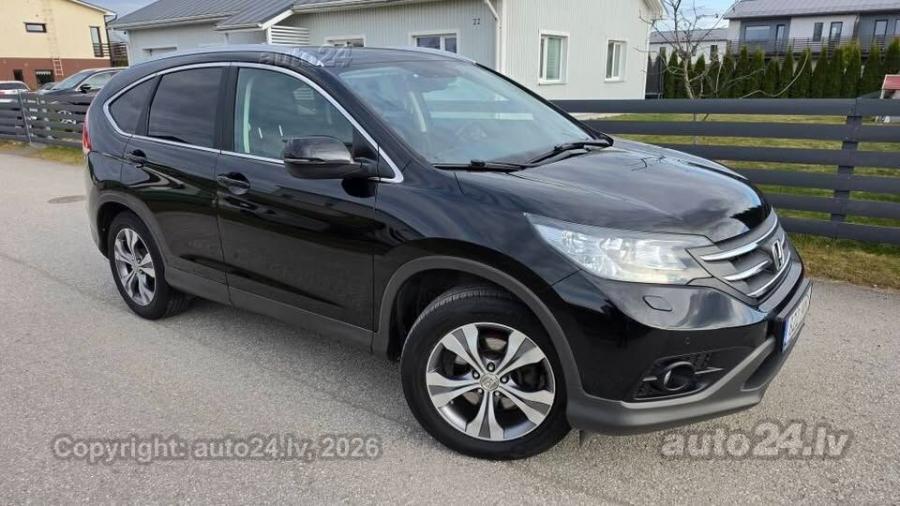 Black Honda CR-V 2013 in Tallinn, with an engine capacity of 2.20 L and mileage of 193 thousand km for 12990 €, photo 1 on AUTOMOTO.COM.LV
