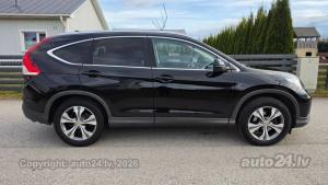 Black Honda CR-V 2013 in Tallinn, with an engine capacity of 2.20 L and mileage of 193 thousand km for 12990 €, photo 3 on AUTOMOTO.COM.LV