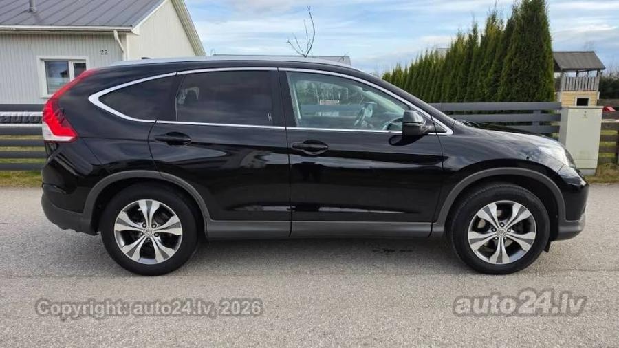 Black Honda CR-V 2013 in Tallinn, with an engine capacity of 2.20 L and mileage of 193 thousand km for 12990 €, photo 3 on AUTOMOTO.COM.LV