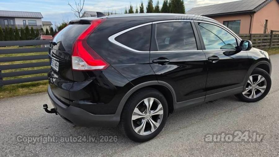 Black Honda CR-V 2013 in Tallinn, with an engine capacity of 2.20 L and mileage of 193 thousand km for 12990 €, photo 4 on AUTOMOTO.COM.LV
