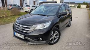 Black Honda CR-V 2013 in Tallinn, with an engine capacity of 2.20 L and mileage of 193 thousand km for 12990 €, photo 6 on AUTOMOTO.COM.LV