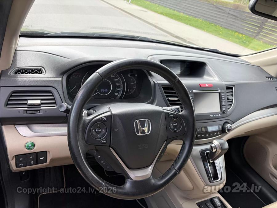 Black Honda CR-V 2013 in Tallinn, with an engine capacity of 2.00 L and mileage of 253 thousand km for 10700 €, photo 10 on AUTOMOTO.COM.LV