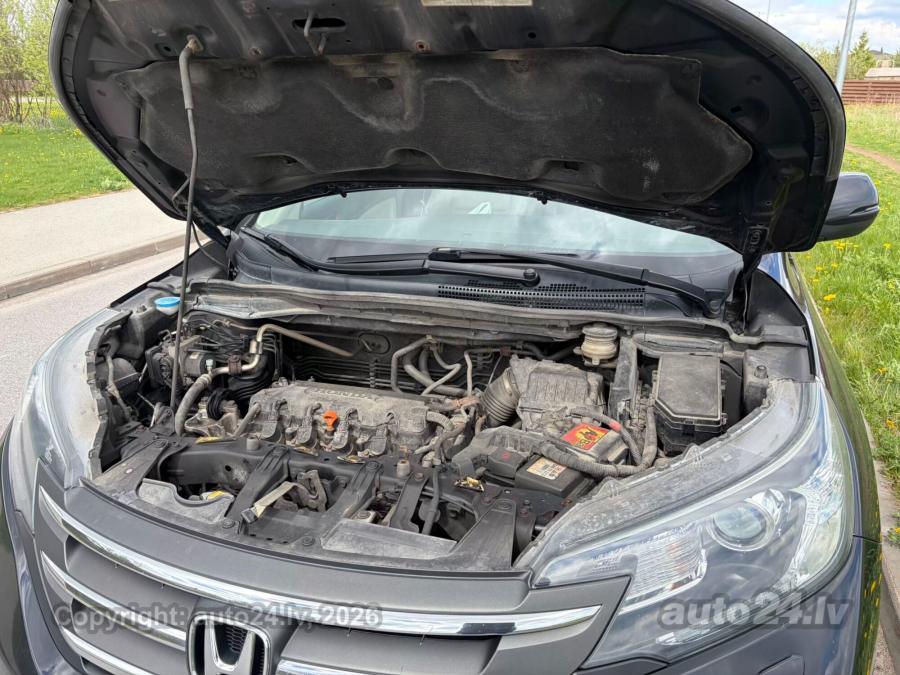 Black Honda CR-V 2013 in Tallinn, with an engine capacity of 2.00 L and mileage of 253 thousand km for 10700 €, photo 12 on AUTOMOTO.COM.LV