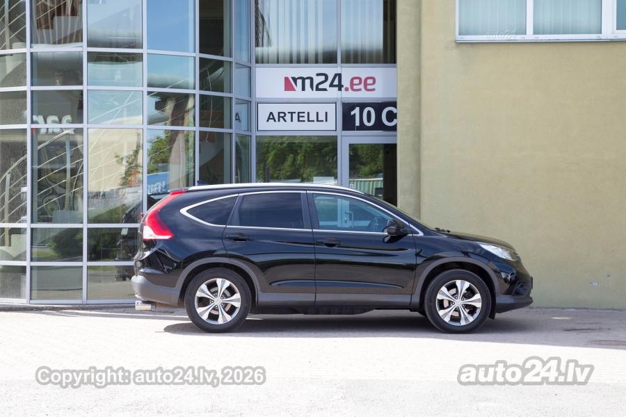 Melns Honda CR-V 2013 Tallina, ar dzinēja tilpumu 2.20 L un nobraukumu 128 tūkst. km par 11990 €, foto 4 vietnē AUTOMOTO.COM.LV