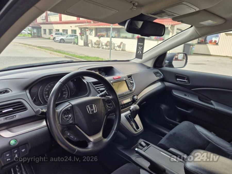 Black Honda CR-V 2014 in Tallinn, with an engine capacity of 2.00 L and mileage of 221 thousand km for 10990 €, photo 10 on AUTOMOTO.COM.LV