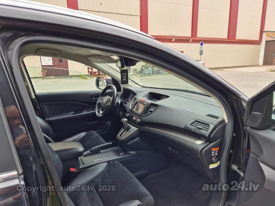 Black Honda CR-V 2014 in Tallinn, with an engine capacity of 2.00 L and mileage of 221 thousand km for 10990 €, photo 11 on AUTOMOTO.COM.LV