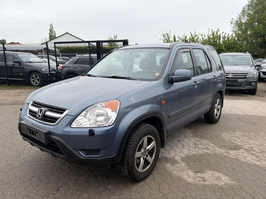 Blue Honda CR-V 2002 in Vilnius, with an engine capacity of 2.00 L and mileage of 243 thousand km for 2999 €, photo 1 on AUTOMOTO.COM.LV