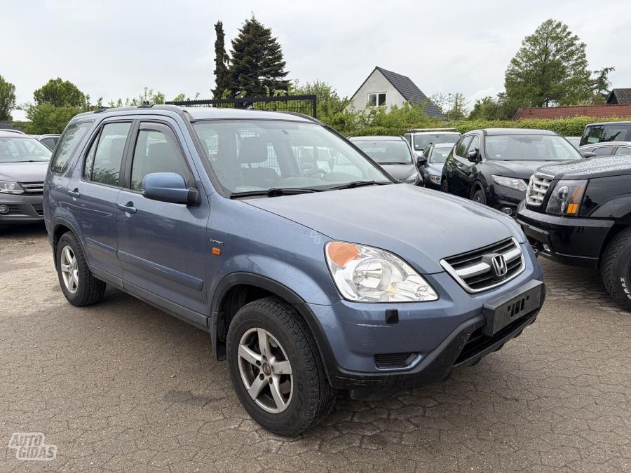 Blue Honda CR-V 2002 in Vilnius, with an engine capacity of 2.00 L and mileage of 243 thousand km for 2999 €, photo 3 on AUTOMOTO.COM.LV