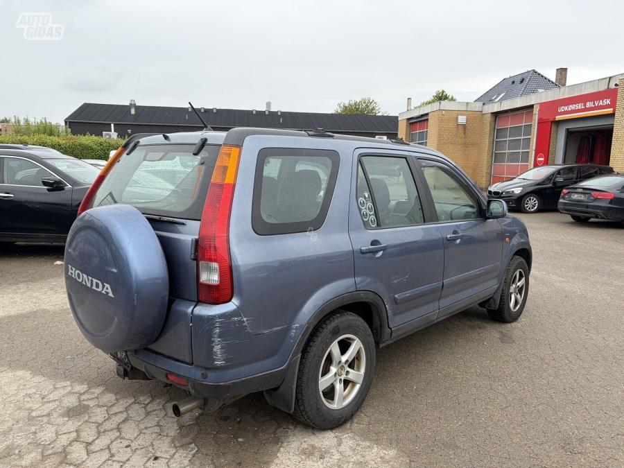 Blue Honda CR-V 2002 in Vilnius, with an engine capacity of 2.00 L and mileage of 243 thousand km for 2999 €, photo 4 on AUTOMOTO.COM.LV