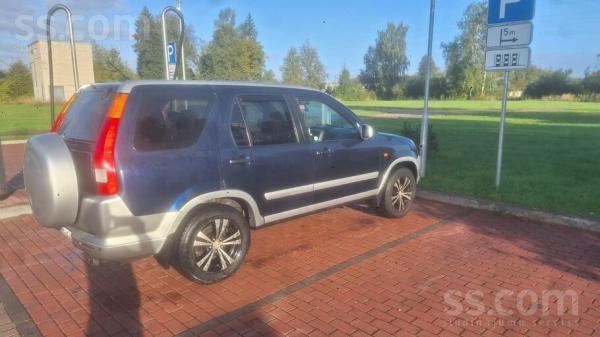 Blue Honda CR-V 2002 in Jelgava, with an engine capacity of 2.00 L and mileage of 214 thousand km for 2100 €, photo 3 on AUTOMOTO.COM.LV
