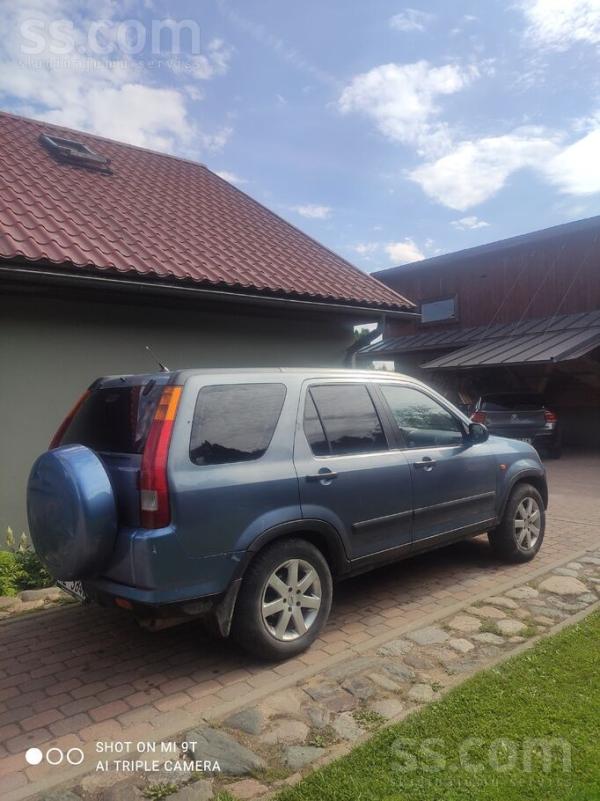 Zils Honda CR-V 2002 Bauska, ar dzinēja tilpumu 2.00 L un nobraukumu 270 tūkst. km par 600 €, foto 1 vietnē AUTOMOTO.COM.LV