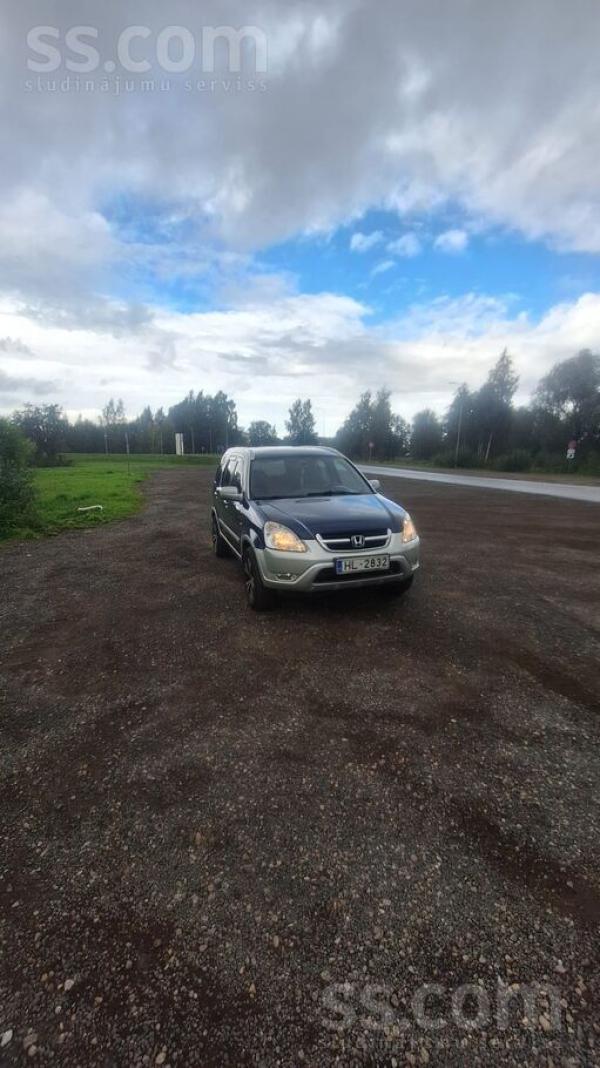 Blue Honda CR-V 2002 in Jelgava, with an engine capacity of 2.00 L and mileage of 232 thousand km for 2350 €, photo 1 on AUTOMOTO.COM.LV