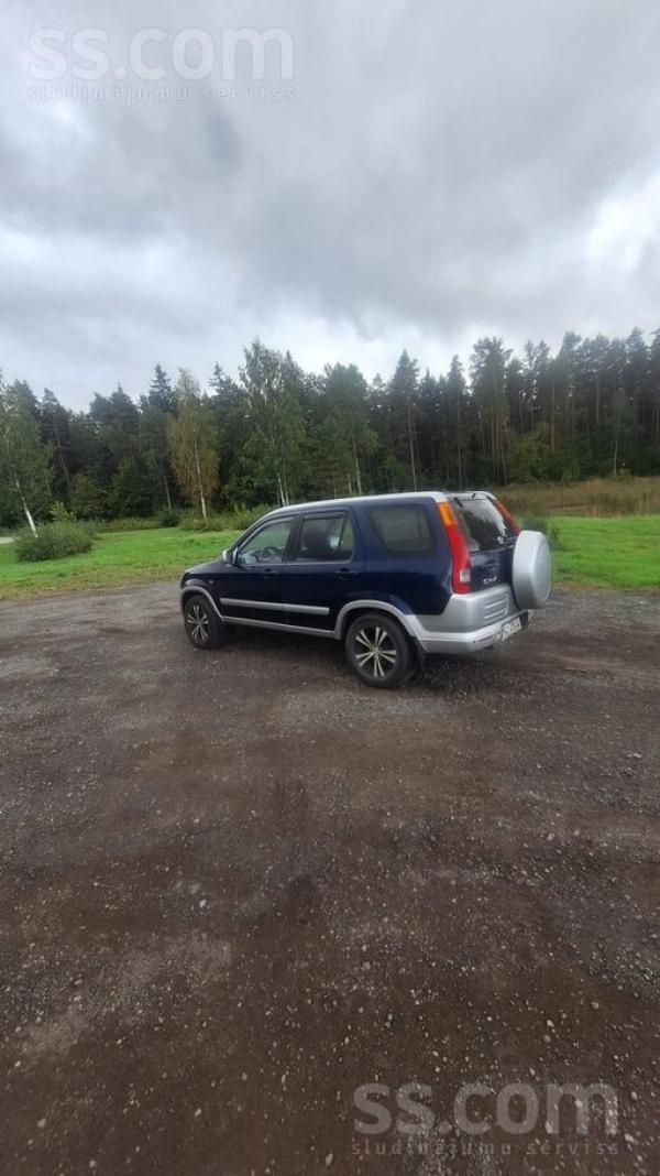 Blue Honda CR-V 2002 in Jelgava, with an engine capacity of 2.00 L and mileage of 232 thousand km for 2350 €, photo 6 on AUTOMOTO.COM.LV