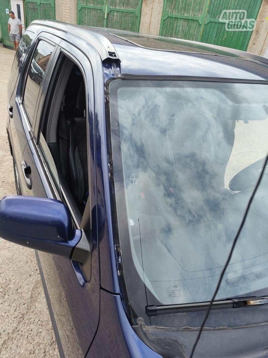 Blue Honda CR-V 2003 in Klaipeda, with an engine capacity of 2.40 L and mileage of 187 thousand km for 800 €, photo 14 on AUTOMOTO.COM.LV